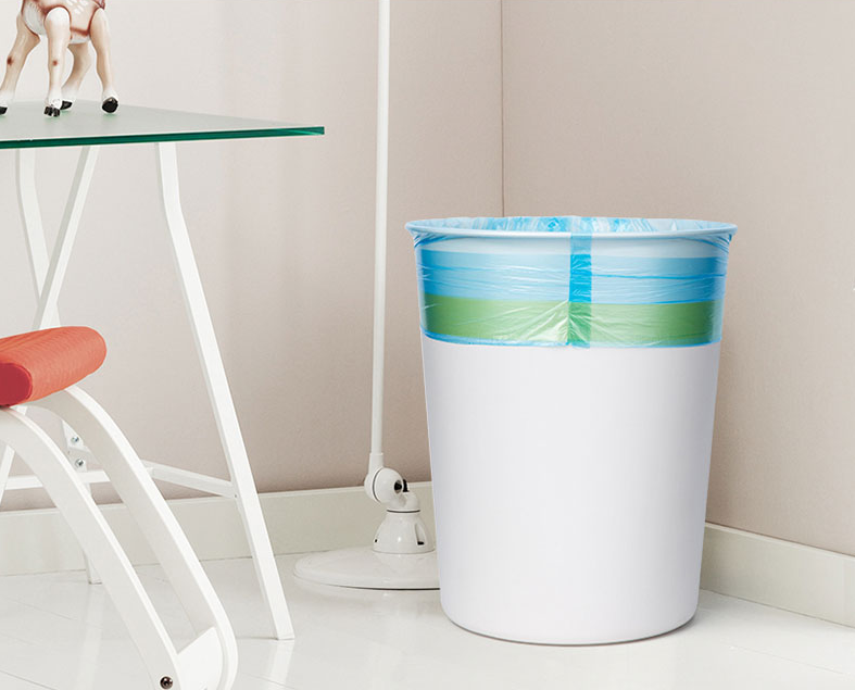 Biodegradable plastic drawstring garbage bags on roll